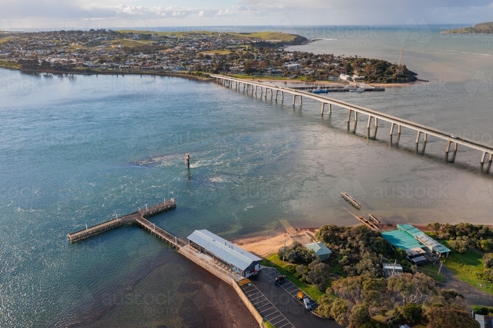 Image of Aerial view of a jetty and narrow bridge linking the mainland ...