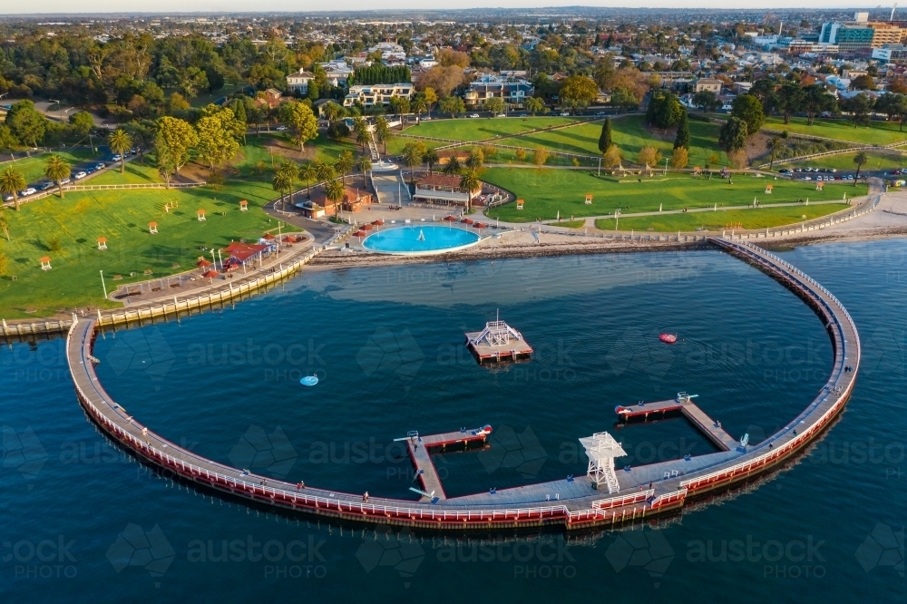 Image of Aerial view of a large circular swimming enclosure along a ...