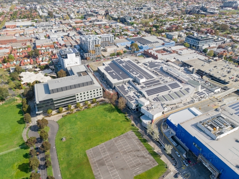 Image of Aerial view of a large inner city shopping centre alongside a ...