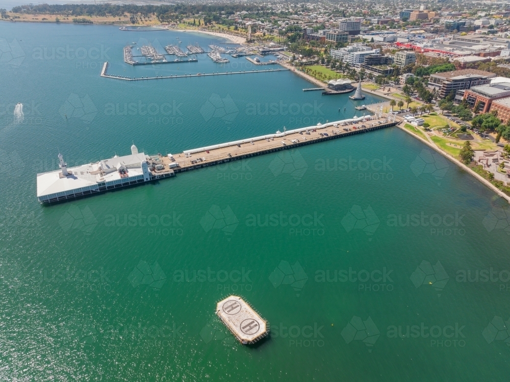 Image of Aerial view of a long narrow jetty and a pontoon helipad on ...
