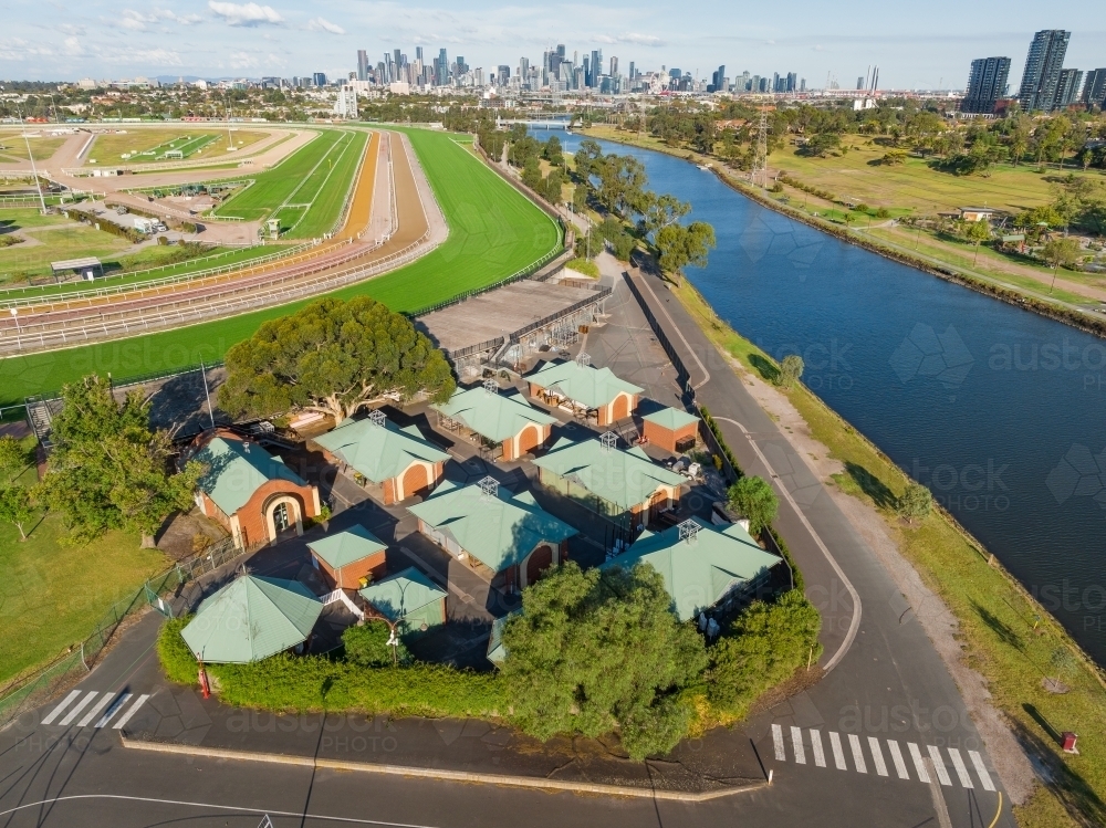 Image of Aerial view of a pavilions on the banks of a river near a race ...