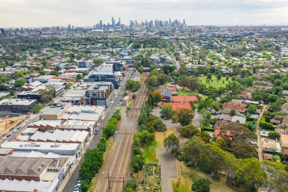 Image of Aerial view of a railway corridor between factories and ...