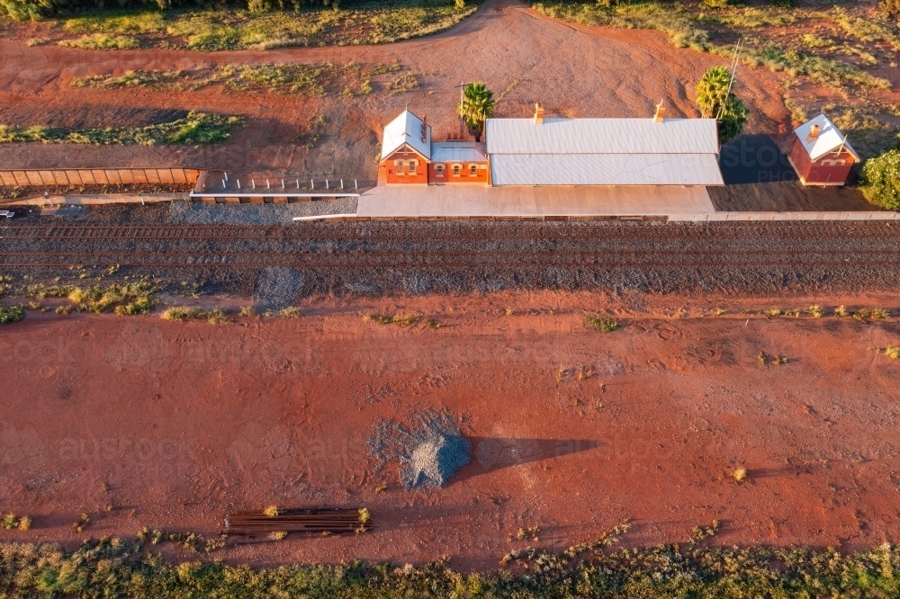 Image of Aerial view of a railway station in an outback town - Austockphoto
