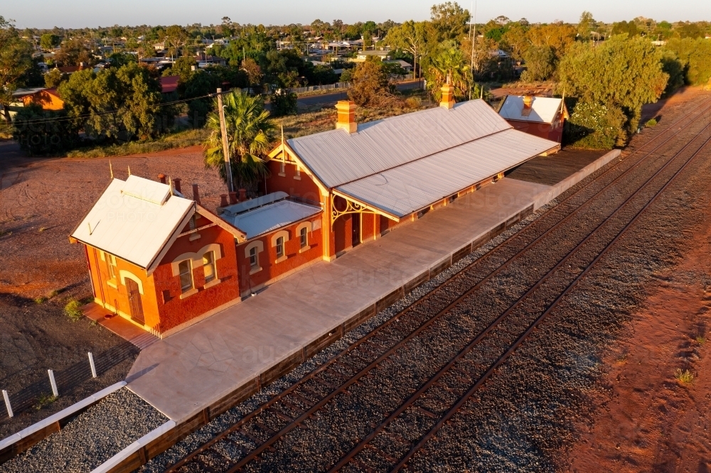 Image of Aerial view of a railway station in an outback town - Austockphoto
