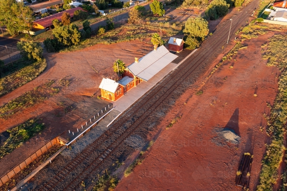 Image of Aerial view of a railway station in an outback town - Austockphoto