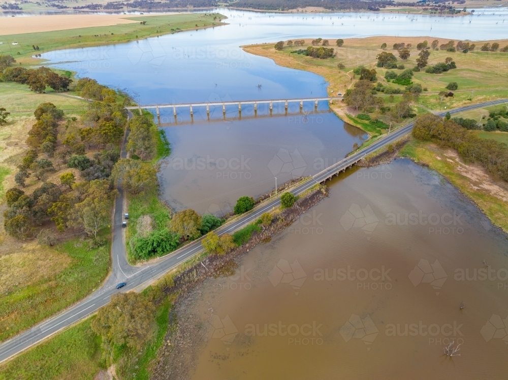 Image of Aerial view of a railway viaduct and a road bridge crossing ...