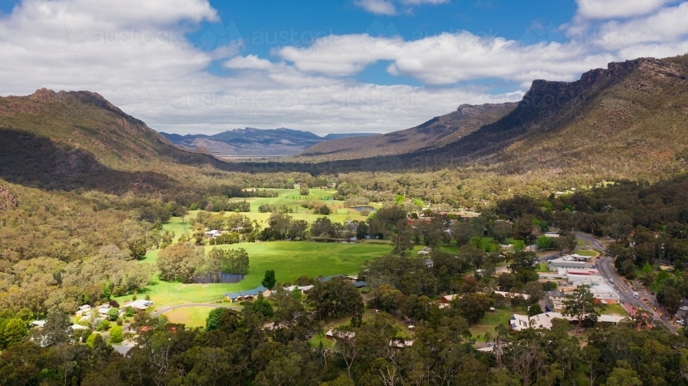 Image of Aerial view of a regional town in a large open valley between ...