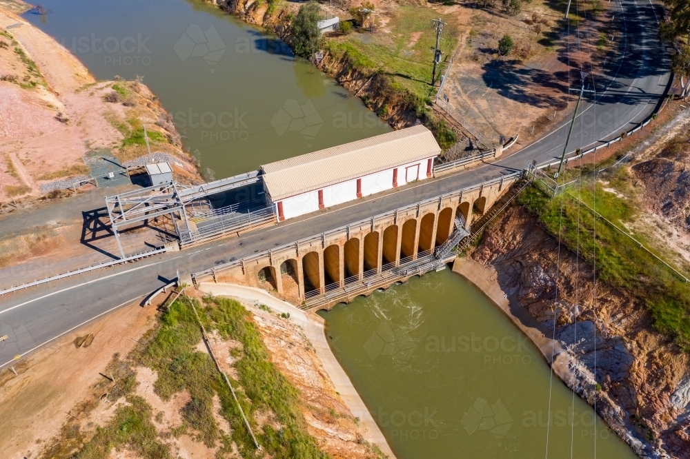 Image of Aerial view of a road crossing over flood gates on a water ...