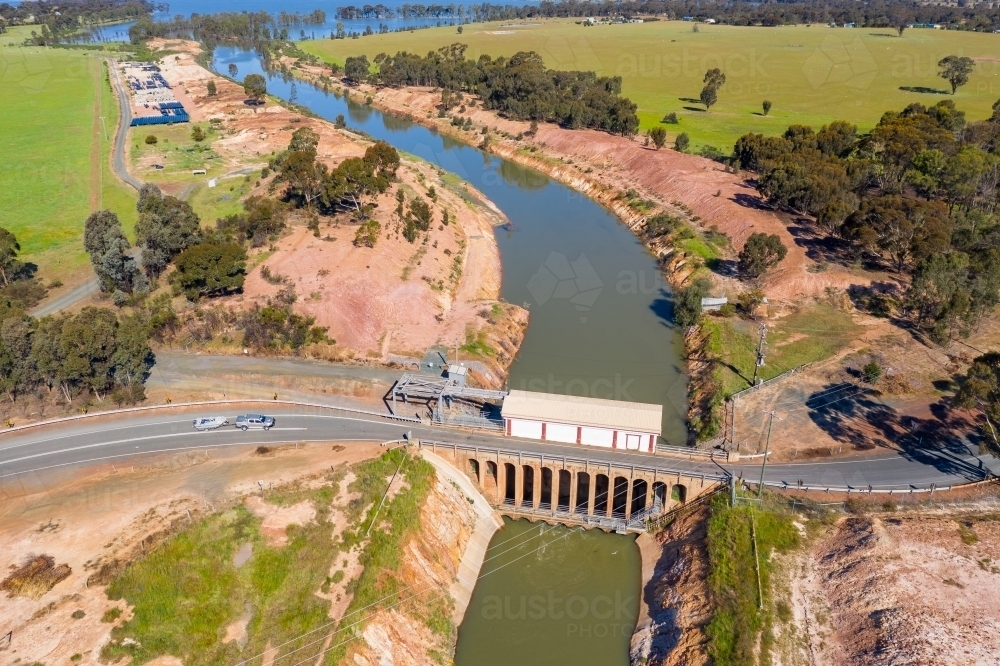 Image of Aerial view of a road crossing over flood gates on a water ...