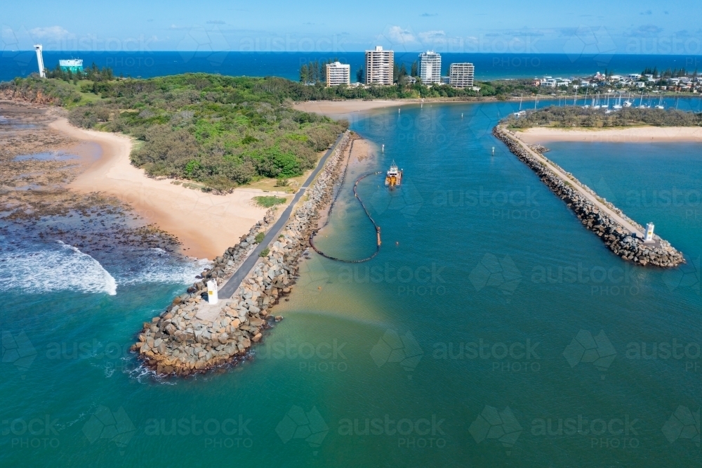 Image of Aerial view of a rocky breakwaters at the entrance to a ...
