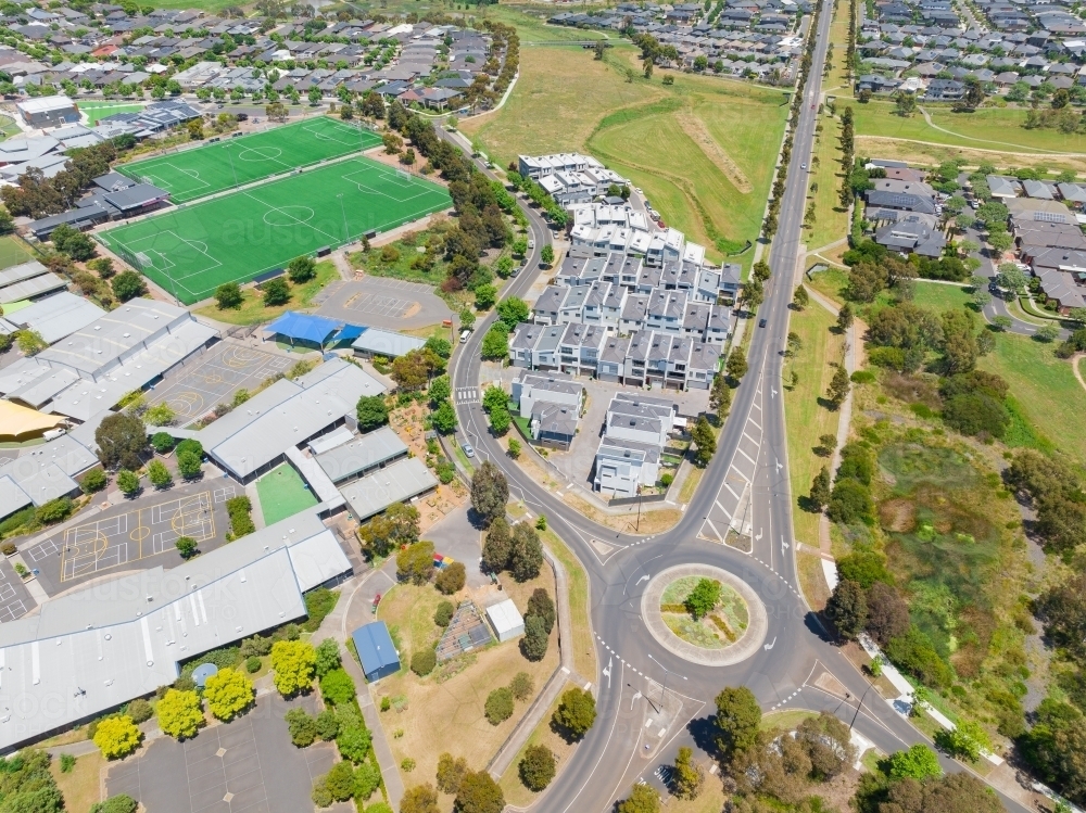 Image of Aerial view of a roundabout and road network around a suburban ...
