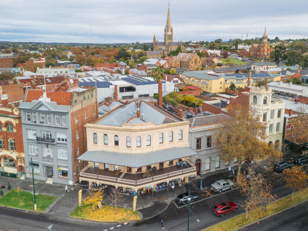 Image of Aerial view of a row of historic buildings around a corner in ...