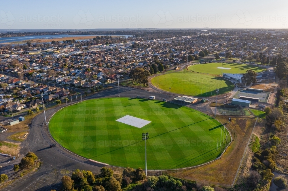 Image of Aerial view of a series of AFL football ovals amongst suburban ...