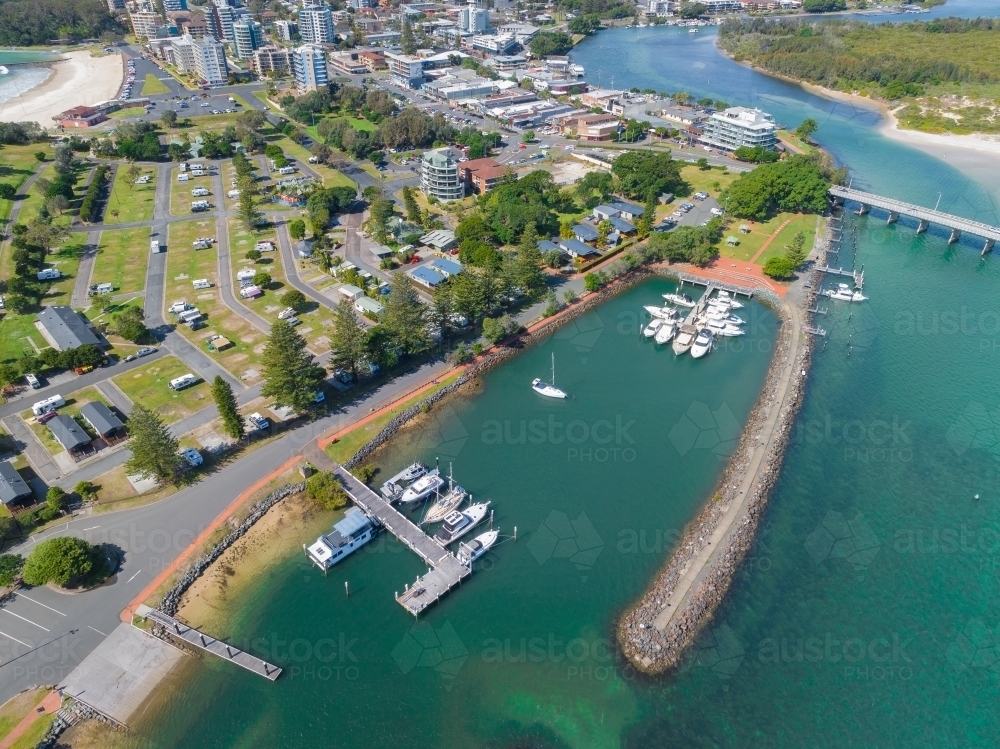 Image of Aerial view of a sheltered marina on a coastal river alongside ...