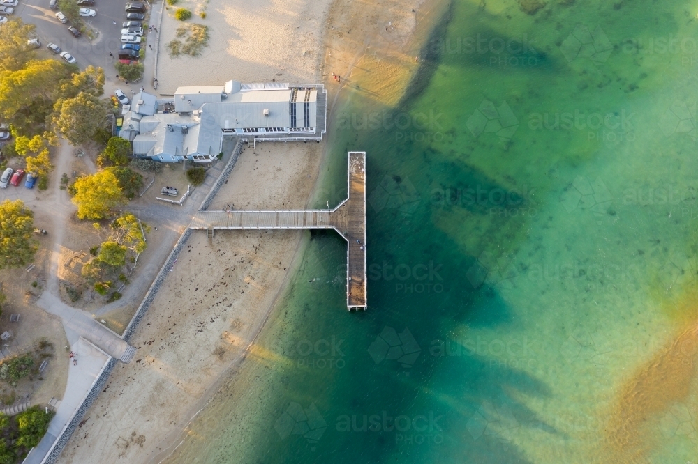 Image of Aerial view of a T shaped jetty and nearby waterfront ...