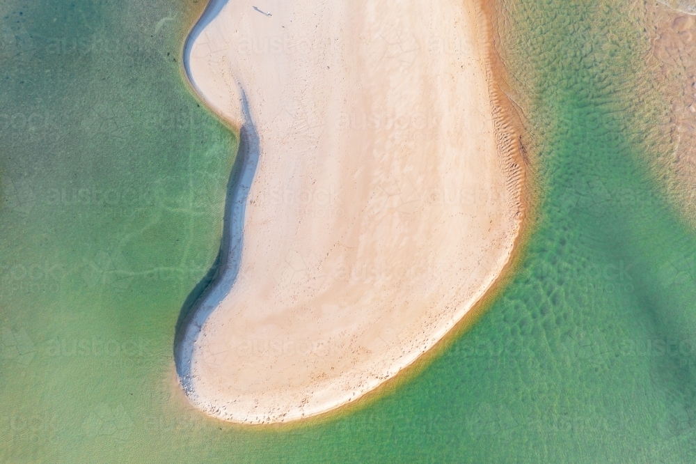 Image of Aerial view of a tidal sand bar in a blue green sea - Austockphoto
