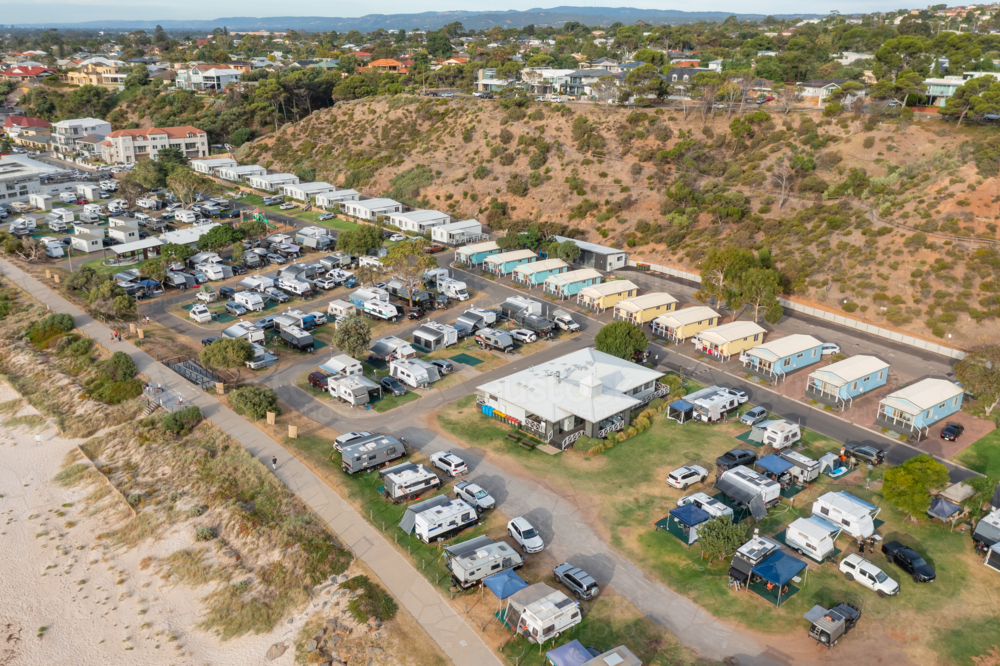 Image of Aerial view of a tourist park full of caravans and cabins ...