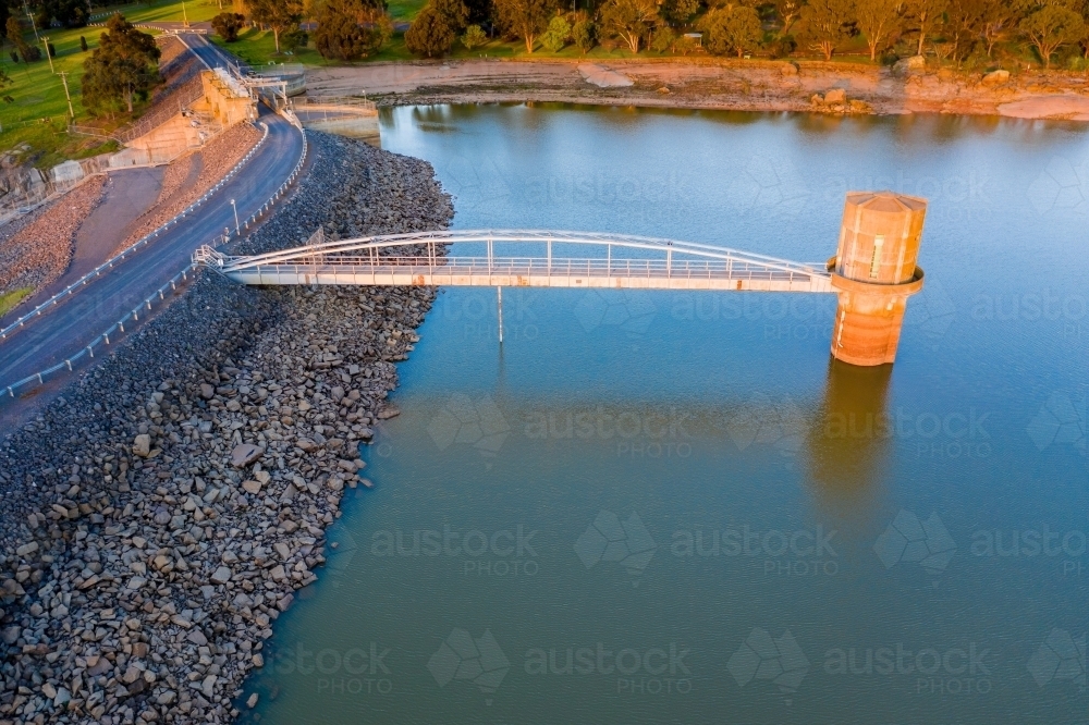 Image of Aerial view of a water tower in a reservoir connected to the ...