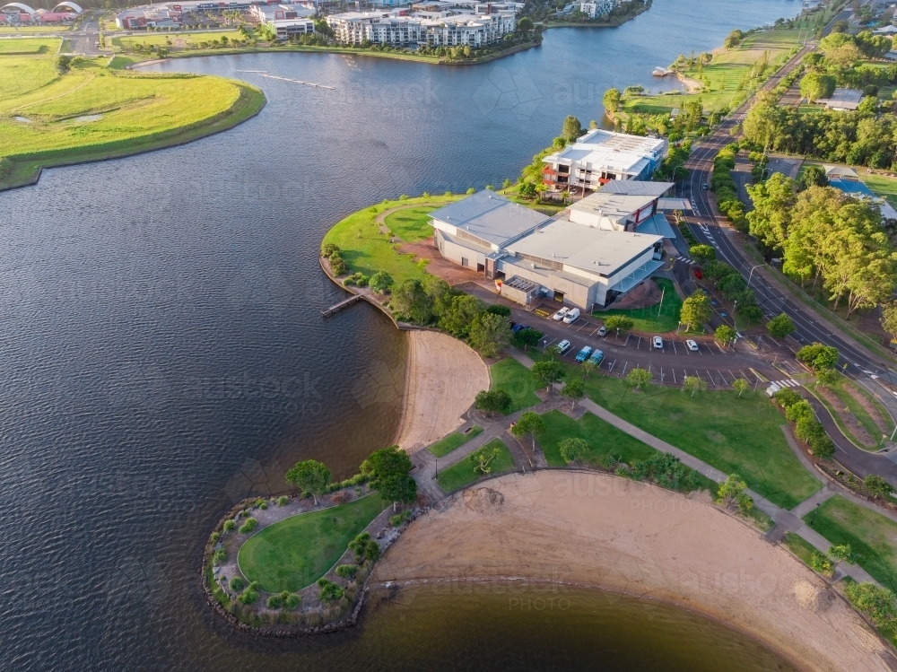 Image of Aerial view of a waterfront reserve with pathways and small ...