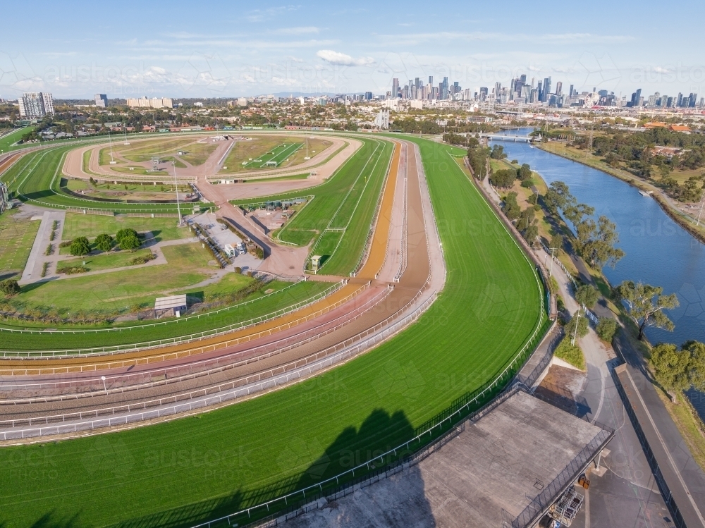 Image of Aerial view of a wide bend on a horse racing track with river ...