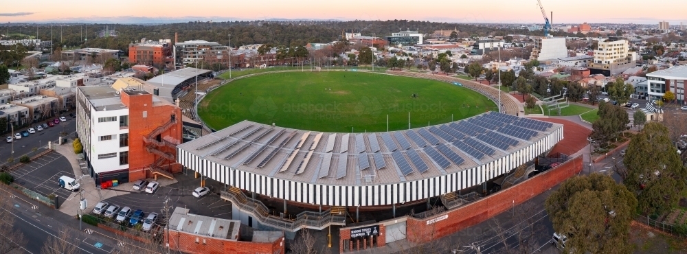 Image of Aerial view of an AFL football stadium amongst suburban ...