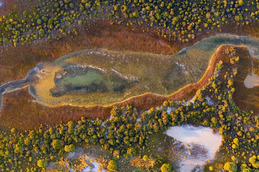 Image of Aerial view of an evaporating salt lagoon on a coastal island ...