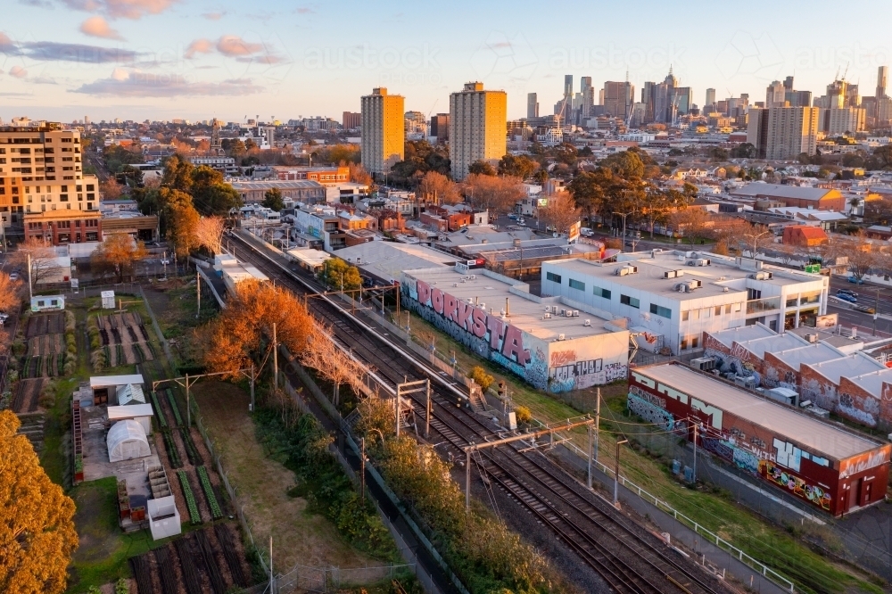 Image of Aerial view of an inner city railway station with surrounding ...