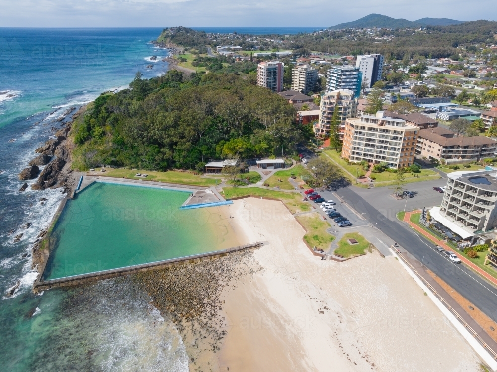 Image of Aerial view of an ocean bath alongside a white sandy beach and ...
