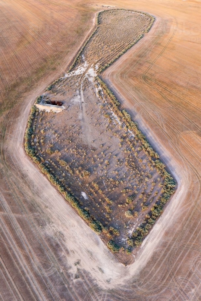 Image of Aerial view of an odd shaped dried waterhole on parched ...