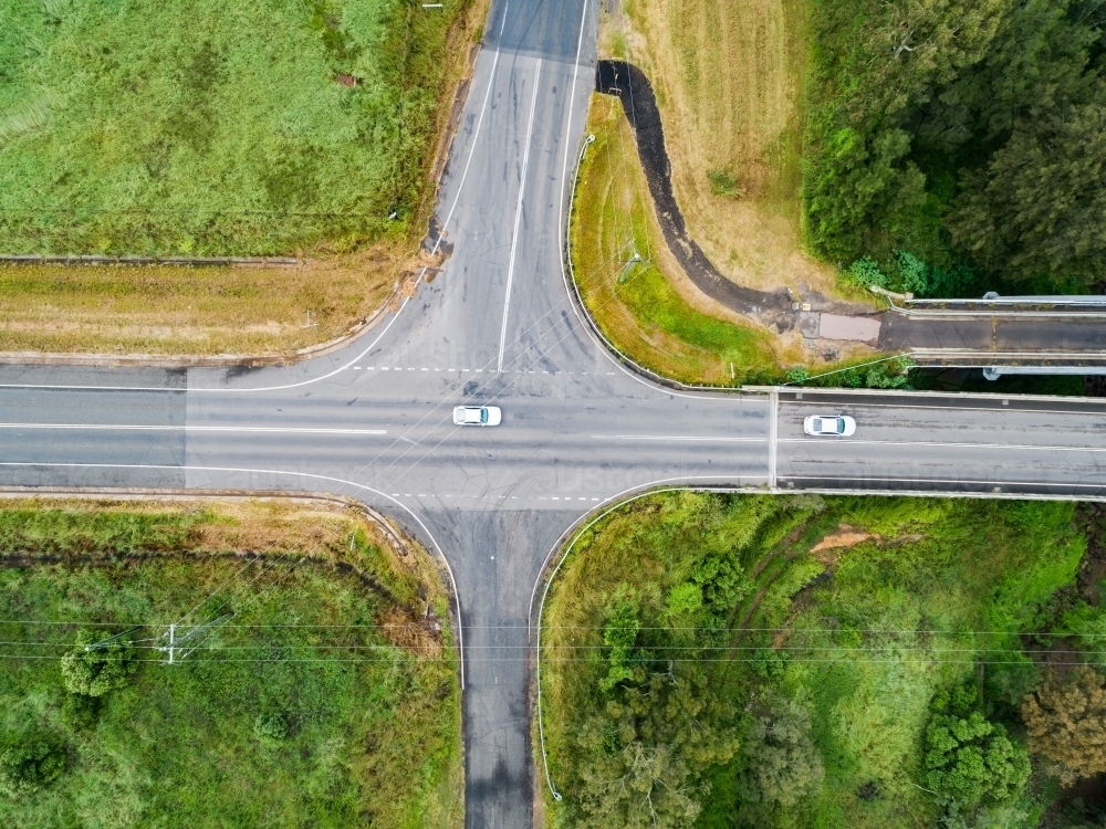 Image of Aerial view of an open rural crossroads bordered by paddocks ...