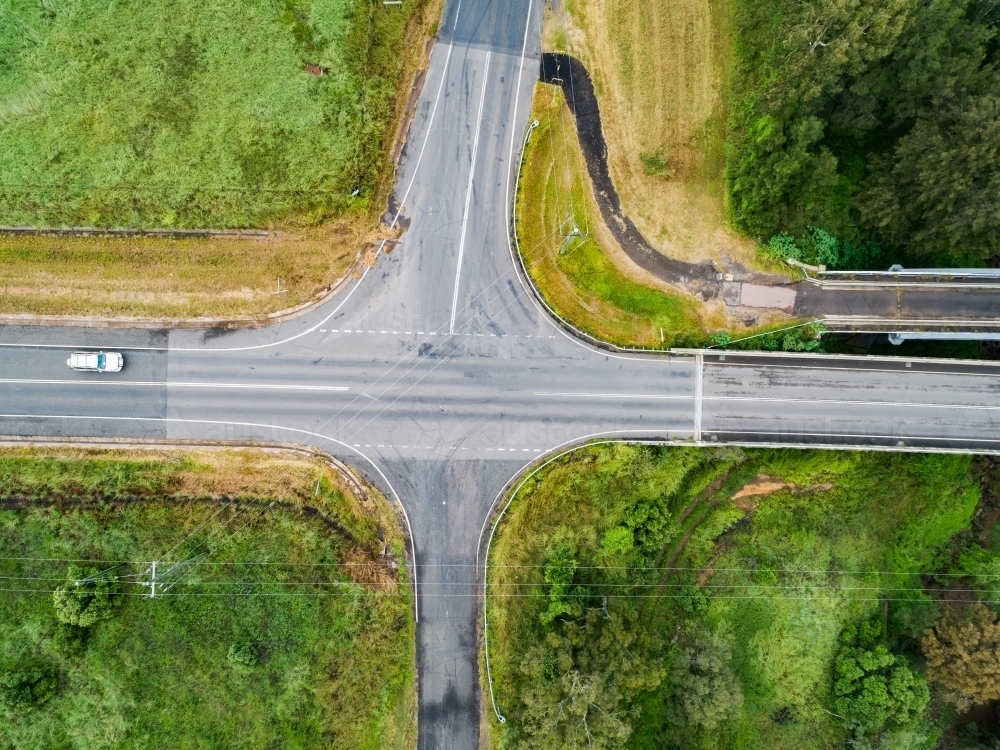 Image of Aerial view of an open rural crossroads bordered by paddocks ...