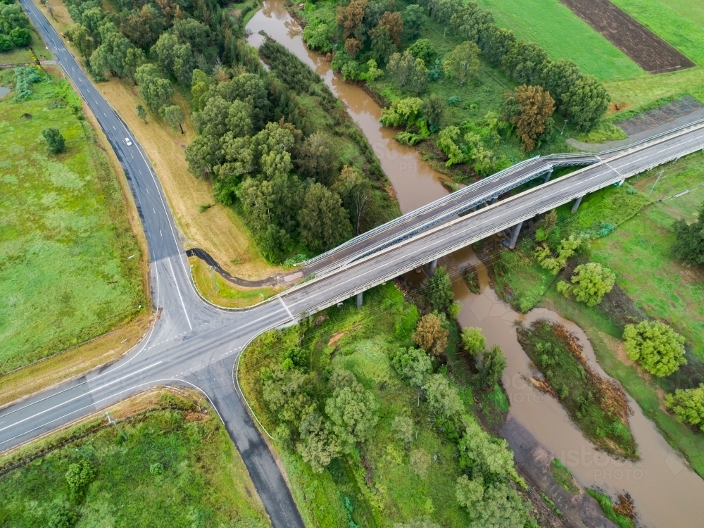 Image of Aerial view of an open rural crossroads bordered by paddocks ...