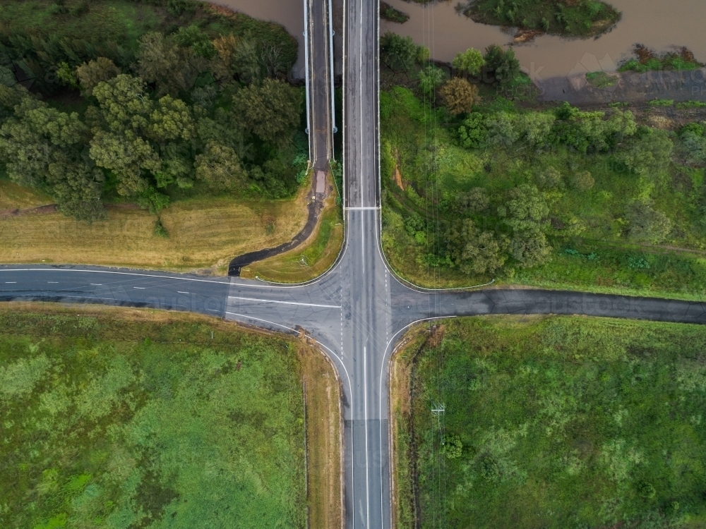 Image of Aerial view of an open rural crossroads bordered by paddocks ...