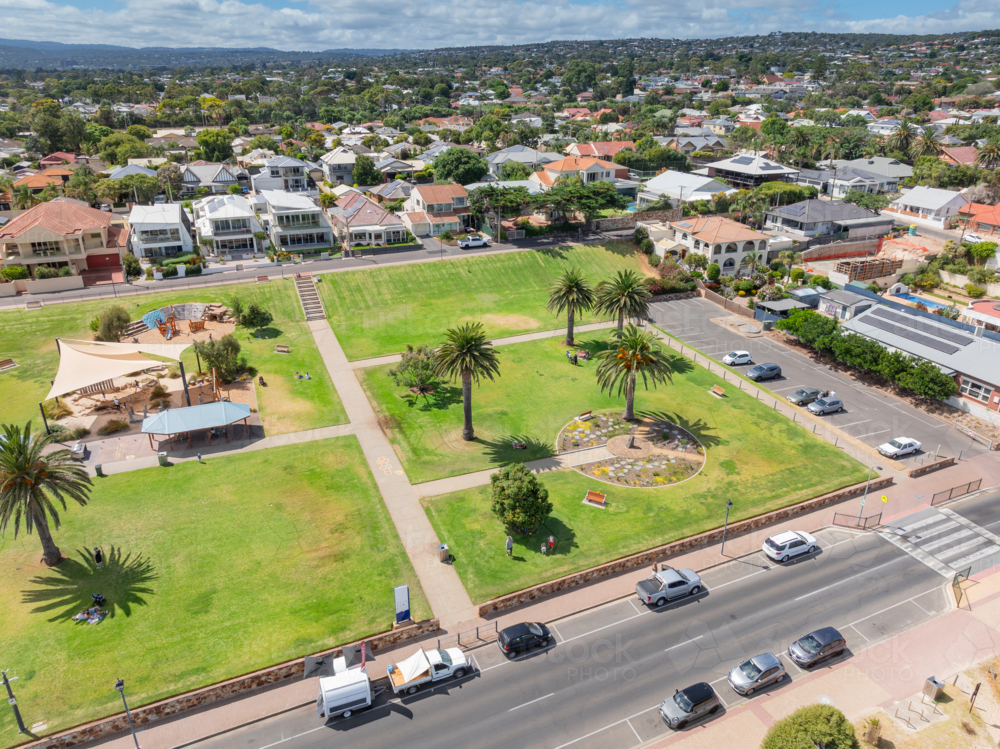 Image of Aerial view of an urban park alongside a residential area with ...