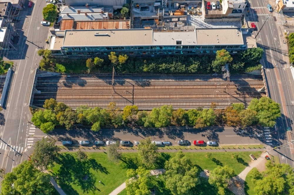 Image of Aerial view of an urban railway line between two road bridges ...
