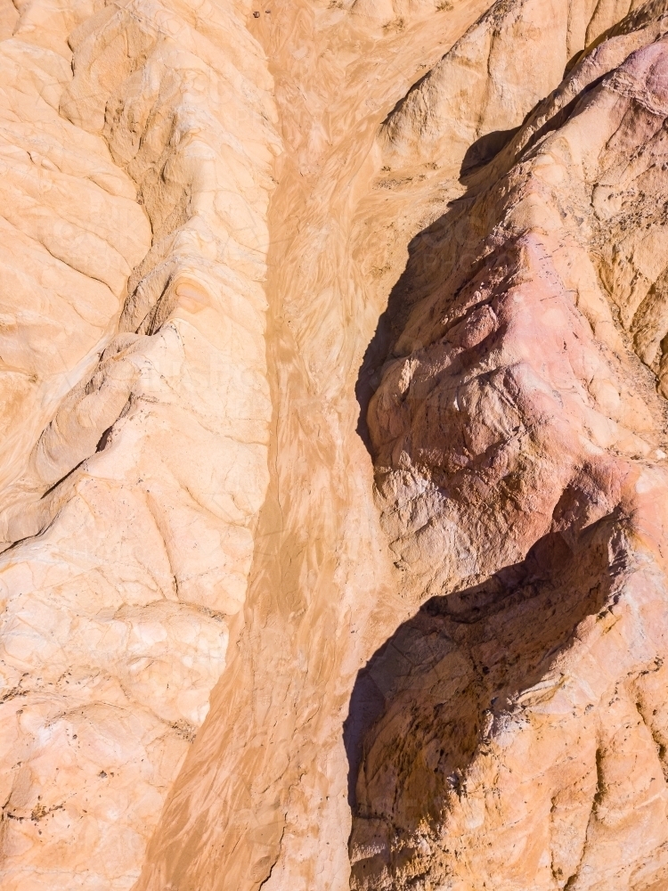 Image of Aerial view of barren hills and gullies caused by erosion ...