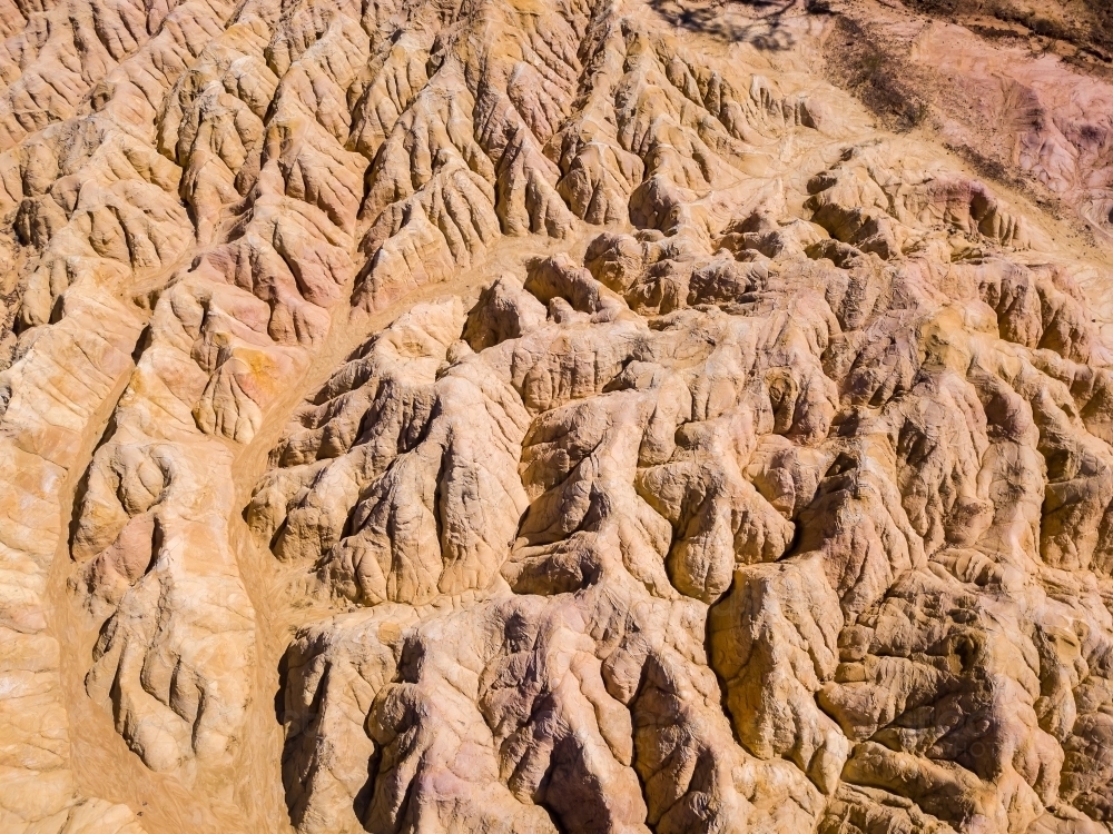 Image of Aerial view of barren hills and gullies caused by erosion ...