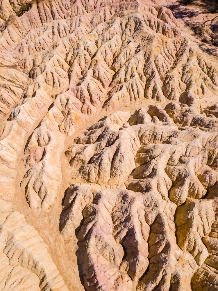 Image of Aerial view of barren hills and gullies caused by erosion ...