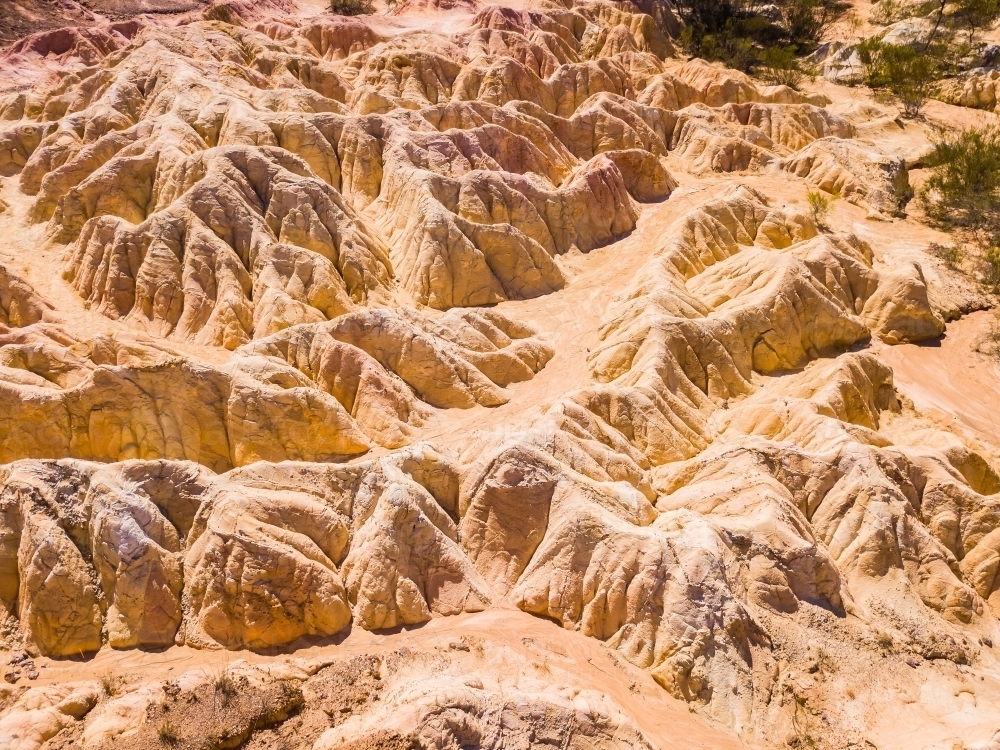 Image of Aerial view of barren hills and gullies caused by erosion ...