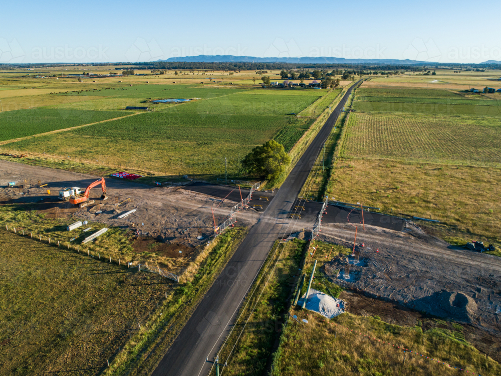 Image of Aerial view of beginnings of bypass highway road under ...