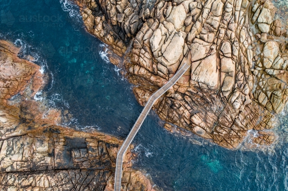 Image of Aerial view of boardwalk among rocky islands. - Austockphoto