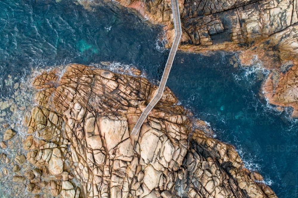 Image of Aerial view of boardwalk among rocky islands. - Austockphoto