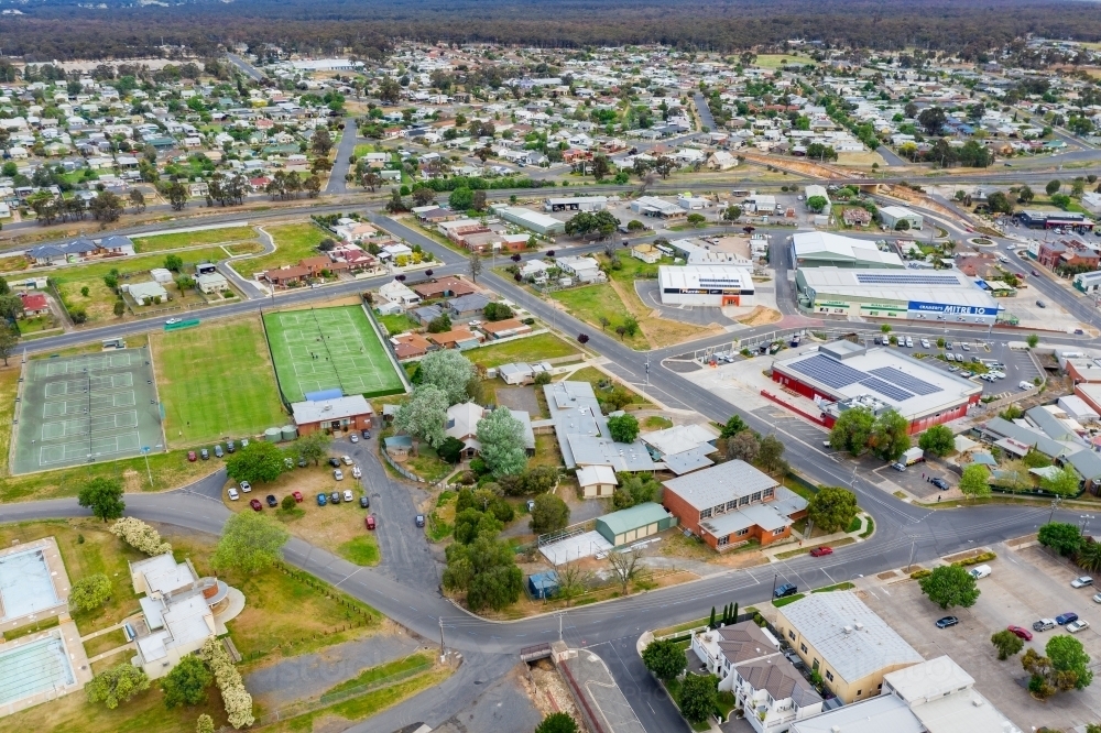 Image of Aerial view of buildings and streets of a country town ...