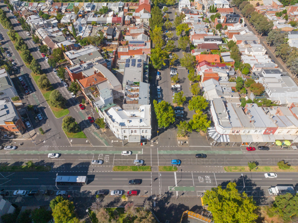 Image of Aerial view of busy city streets with angled tree lined ...