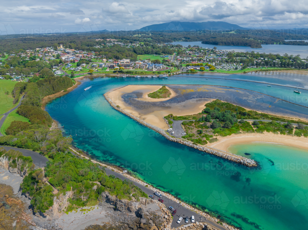 Image of Aerial view of calm blue water in a winding coatsal inlet ...