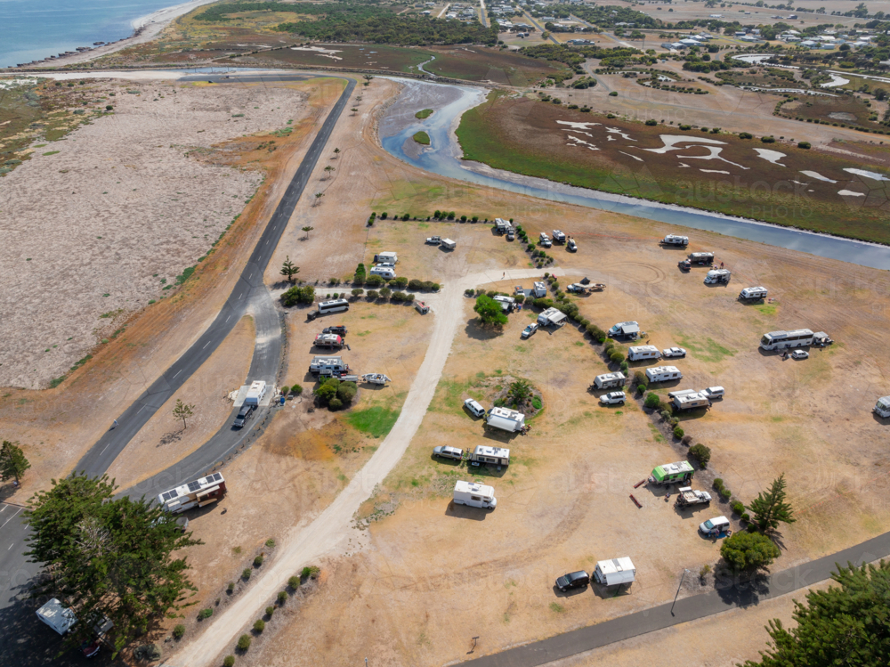 Image of Aerial view of cars and caravans in an coastal RV park on dry ...