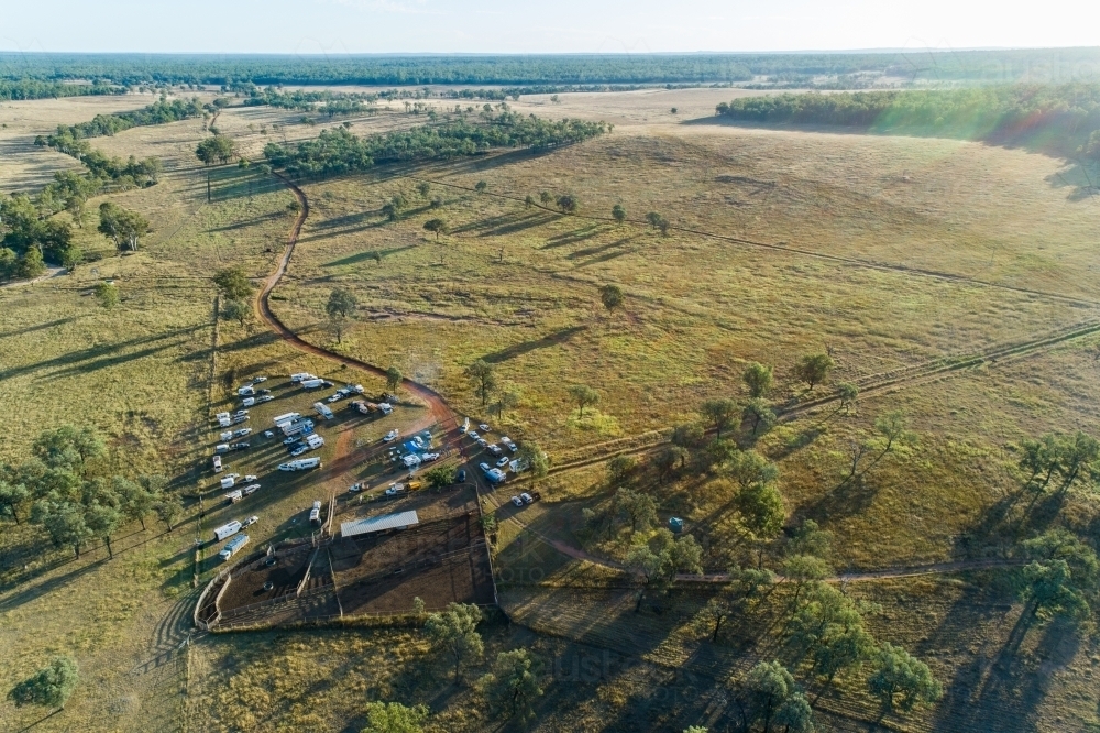 Image of Aerial view of cattle yards and campsite on a farm. - Austockphoto