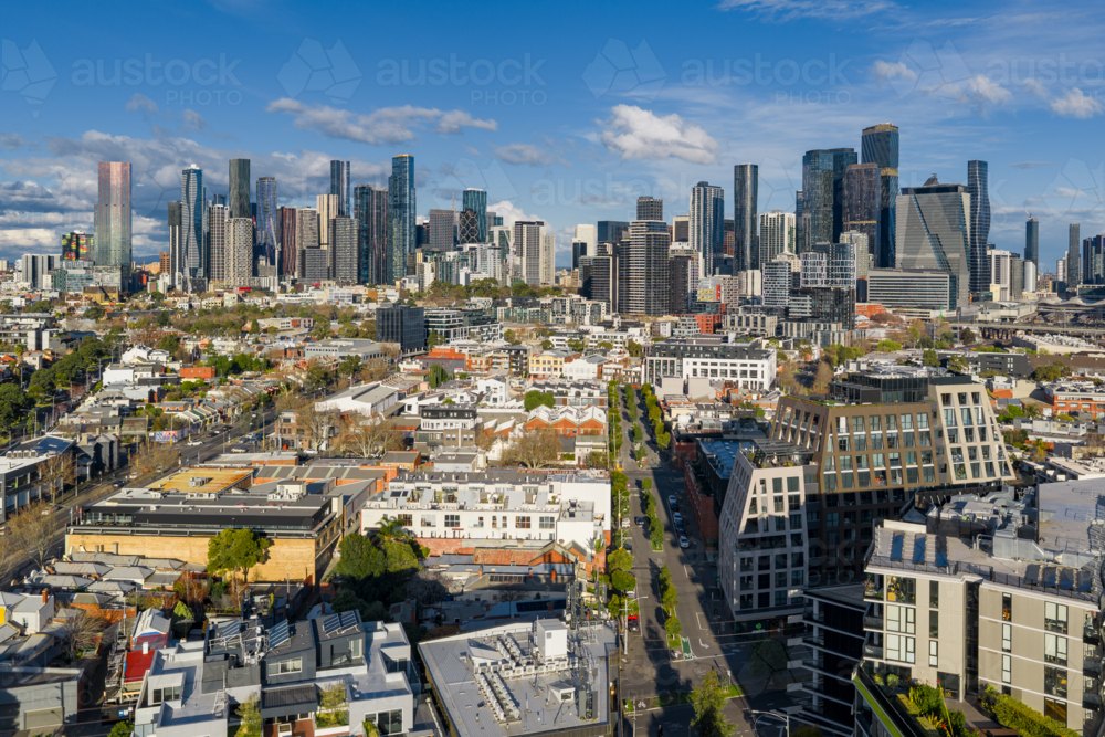 Image of Aerial view of city buildings along a main street with a city ...