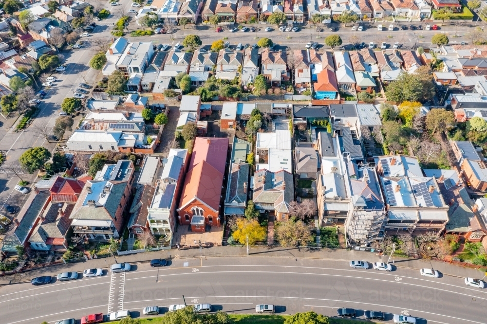 Image of Aerial view of city streets full of historical houses and ...