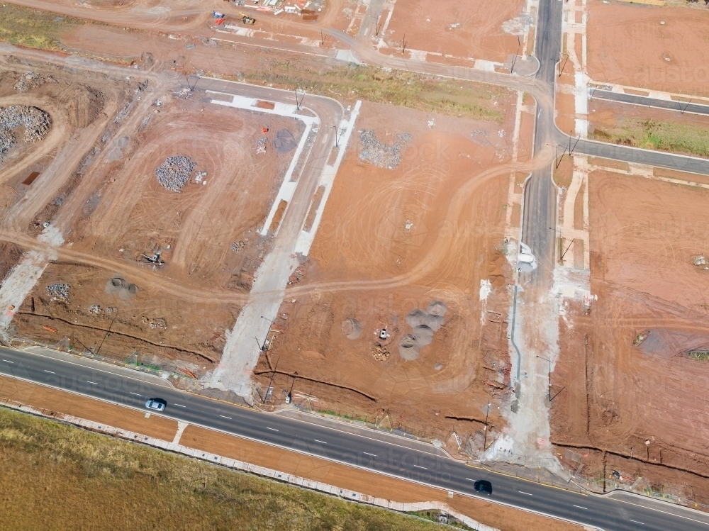 Image of Aerial view of cleared land blocks in an urban subdivision ...